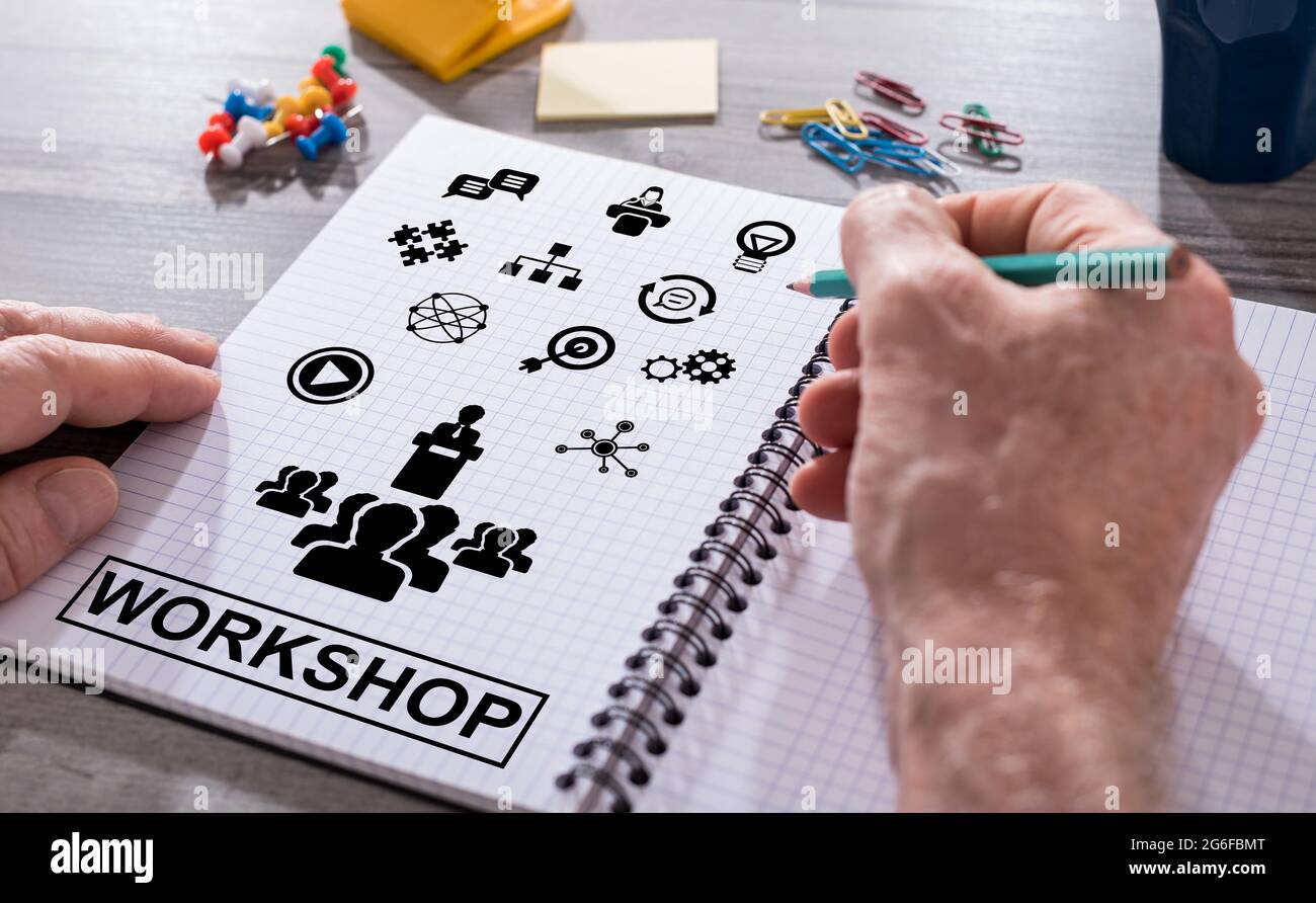 Hand drawing workshop concept on a notepad Stock Photo - Alamy