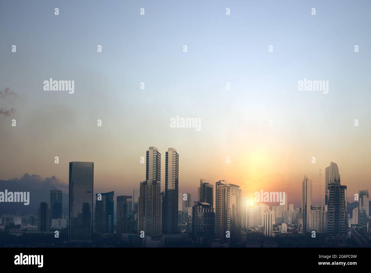 Skyscrapers and modern buildings with the sunset scene background Stock ...
