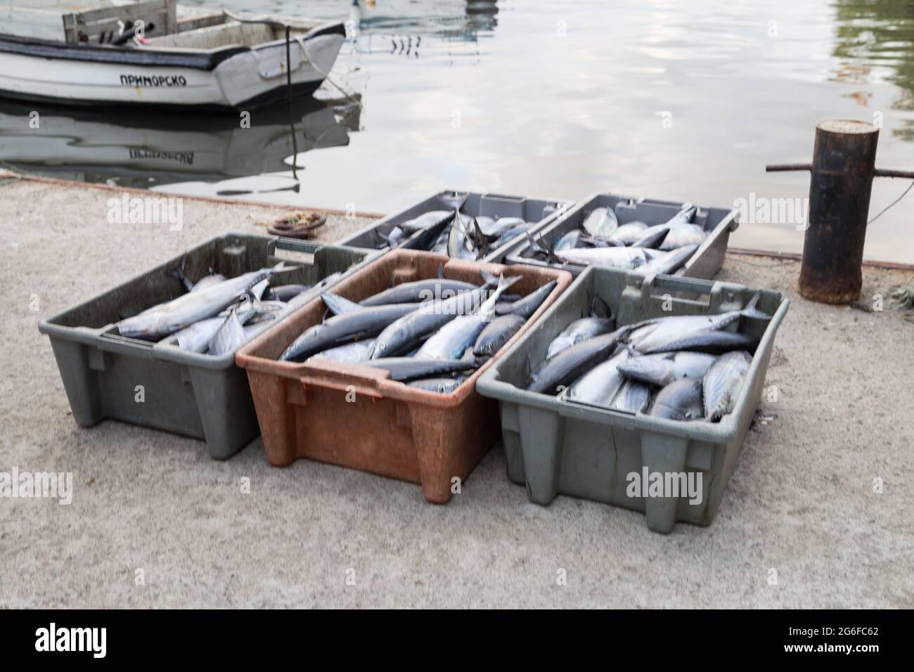Pier with fishing boats hi-res stock photography and images - Alamy