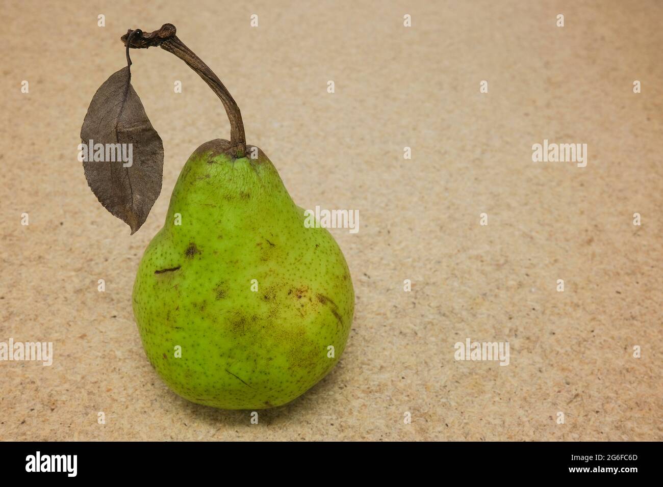 One green pear Stock Photo - Alamy