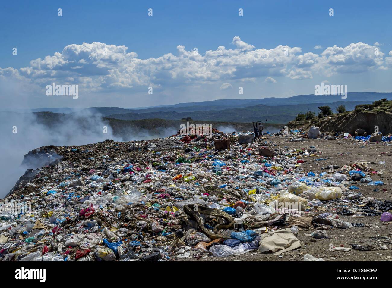 View of garbage field in trash dump or open landfill Stock Photo - Alamy