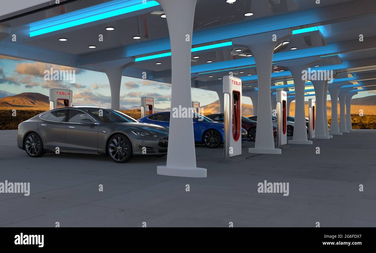 Tesla electric cars at a fast charging station Stock Photo - Alamy