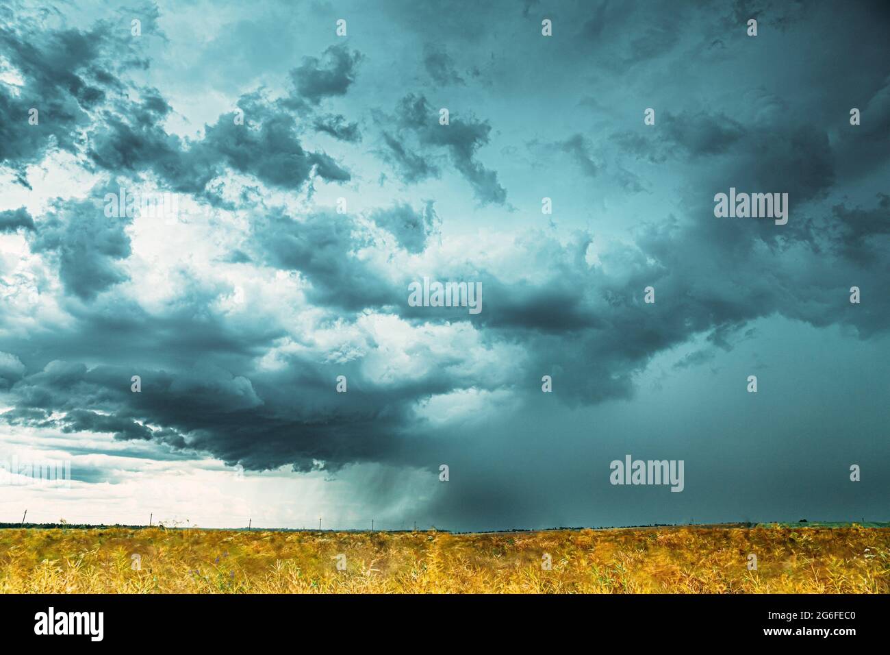 Dramatic Rainy Sky With Rain Clouds On Horizon Above Rural Landscape ...