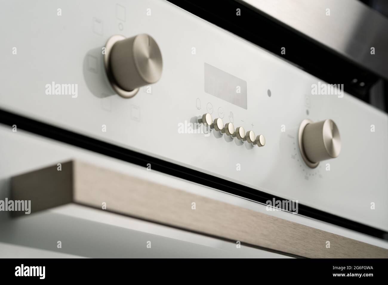Modern oven mode control button close up Stock Photo - Alamy