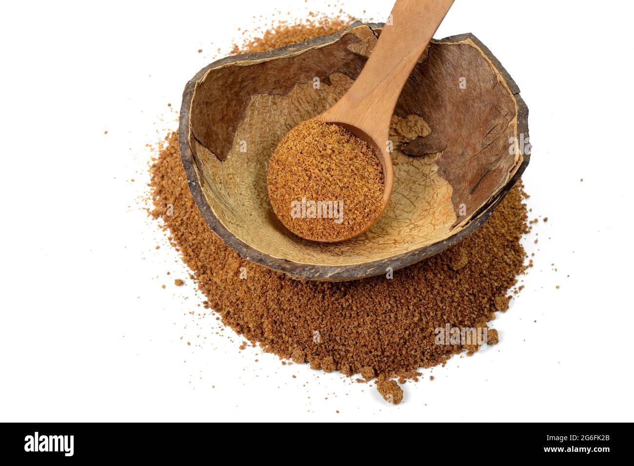 Sweet coconut sugar in coconut shell isolated on white background Stock ...
