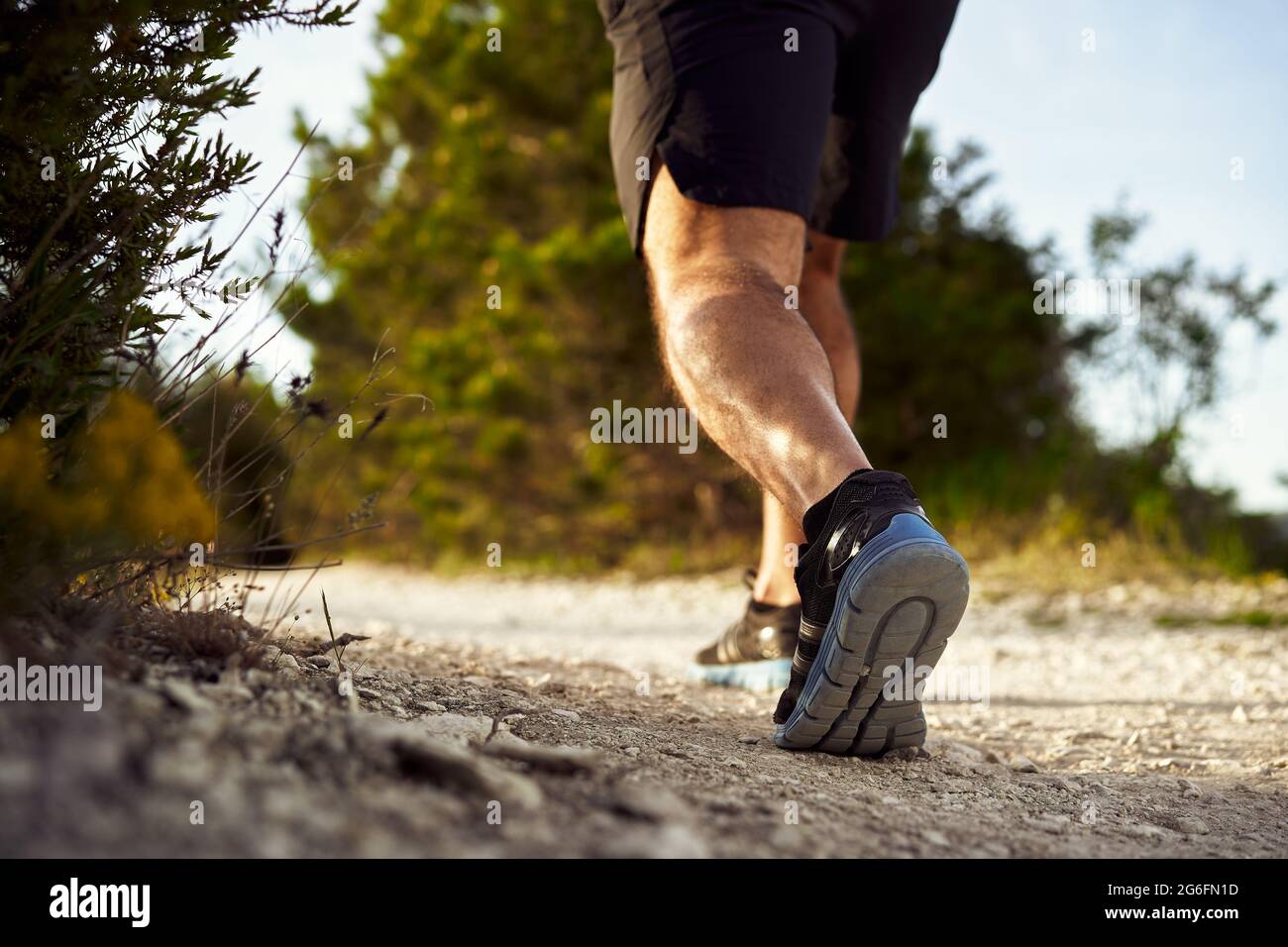 Male muscular legs running hi-res stock photography and images - Alamy
