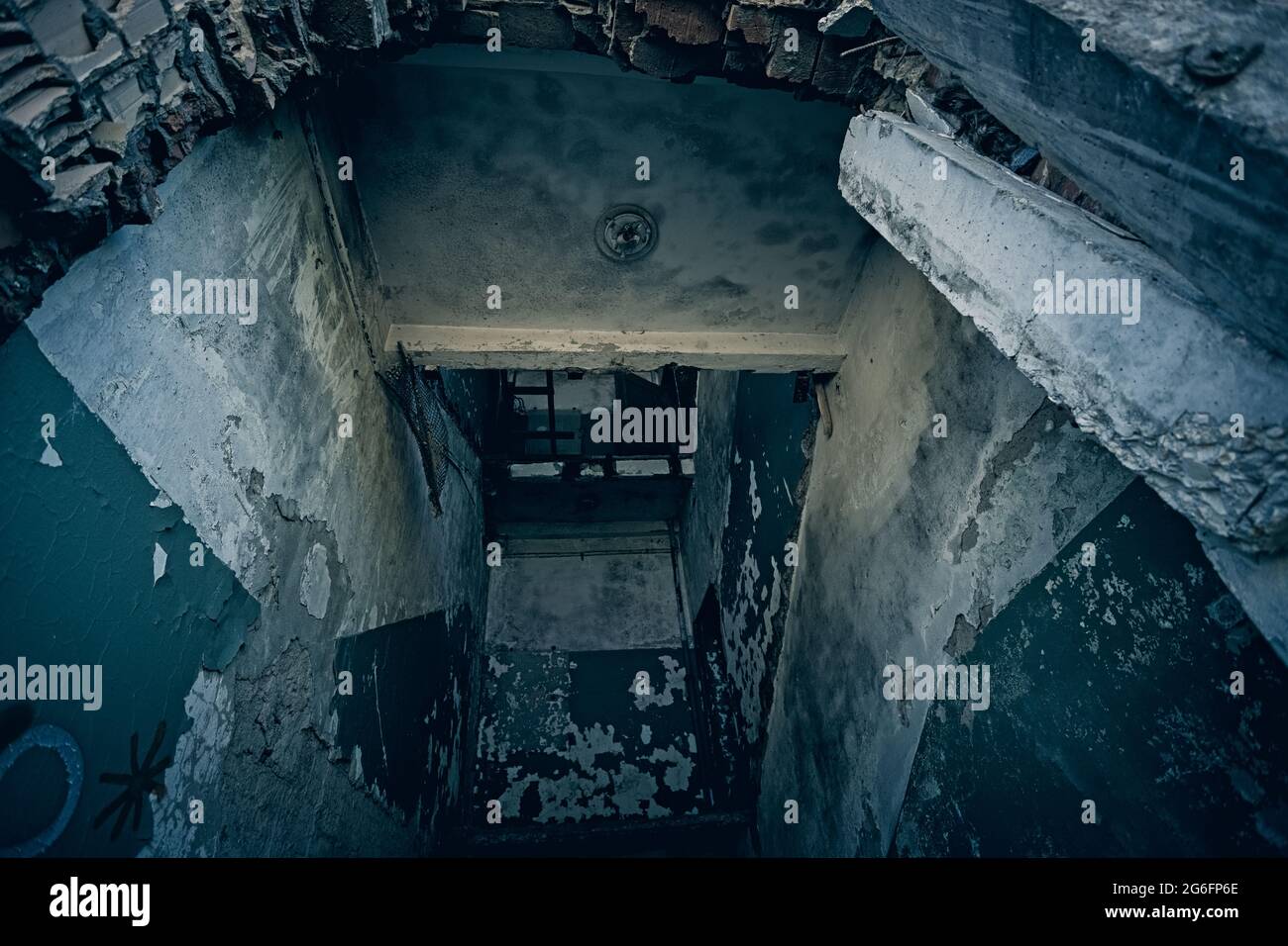 Dilapidated, scary houses, crumbling walls. Old ruined factory building ...