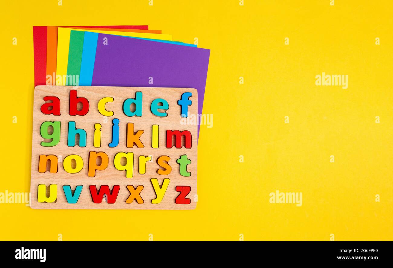 Learning letters, website, video blog. Yellow background Copy space ...
