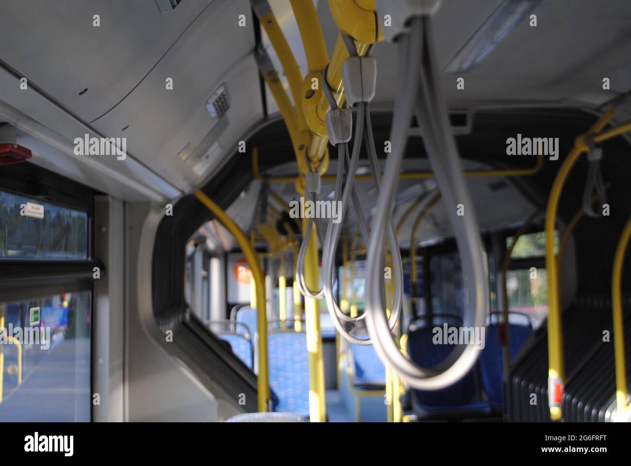 Handles standing passenger inside bus transportation hi-res stock ...