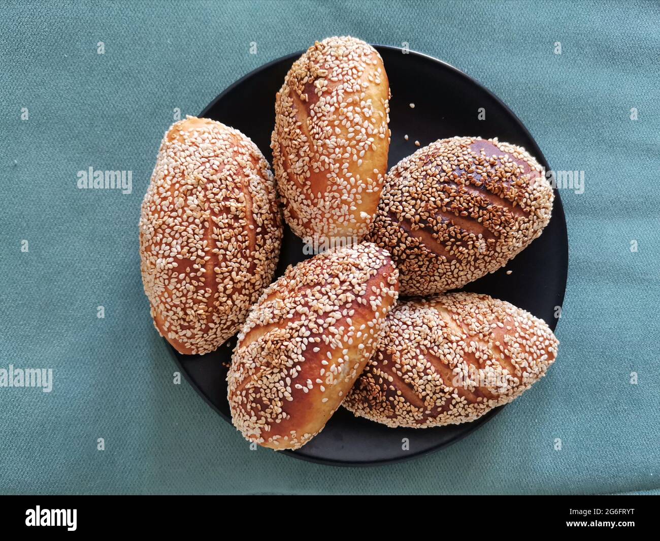 Homemade breakfast bun with cheese, sesame seeds Stock Photo - Alamy