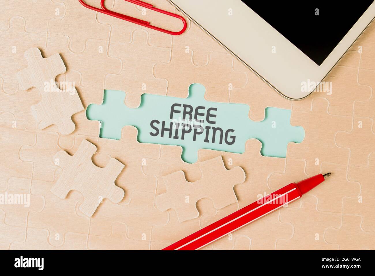 Hand writing sign Free Shipping. Business showcase retailing strategy ...