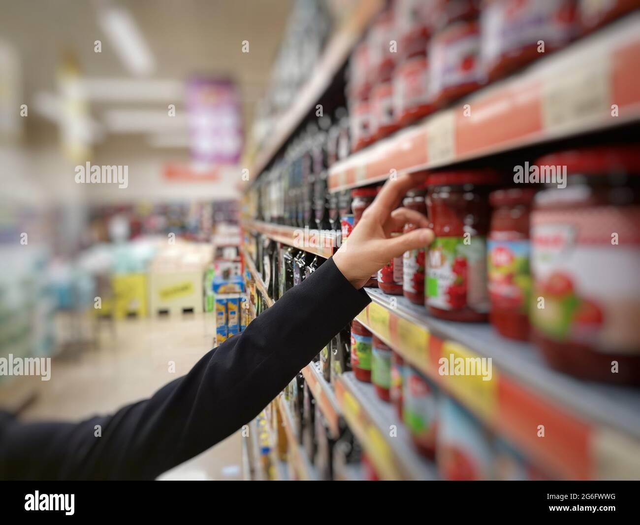 People grocery shopping basket cart hi-res stock photography and images ...