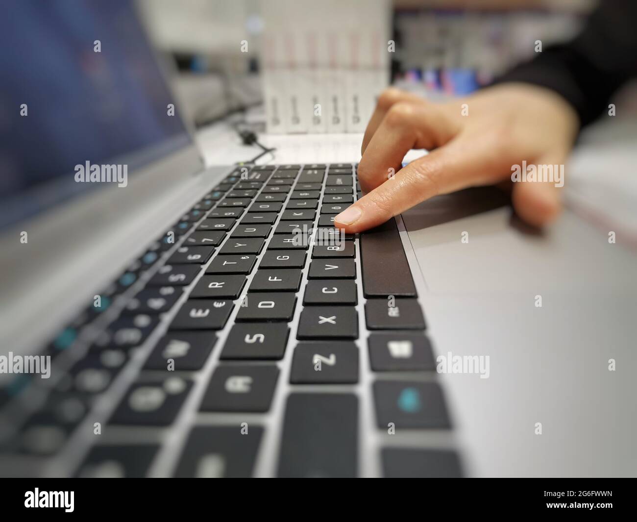 Typing on the keyboard. Using the keyboard. The hand on the keyboard ...