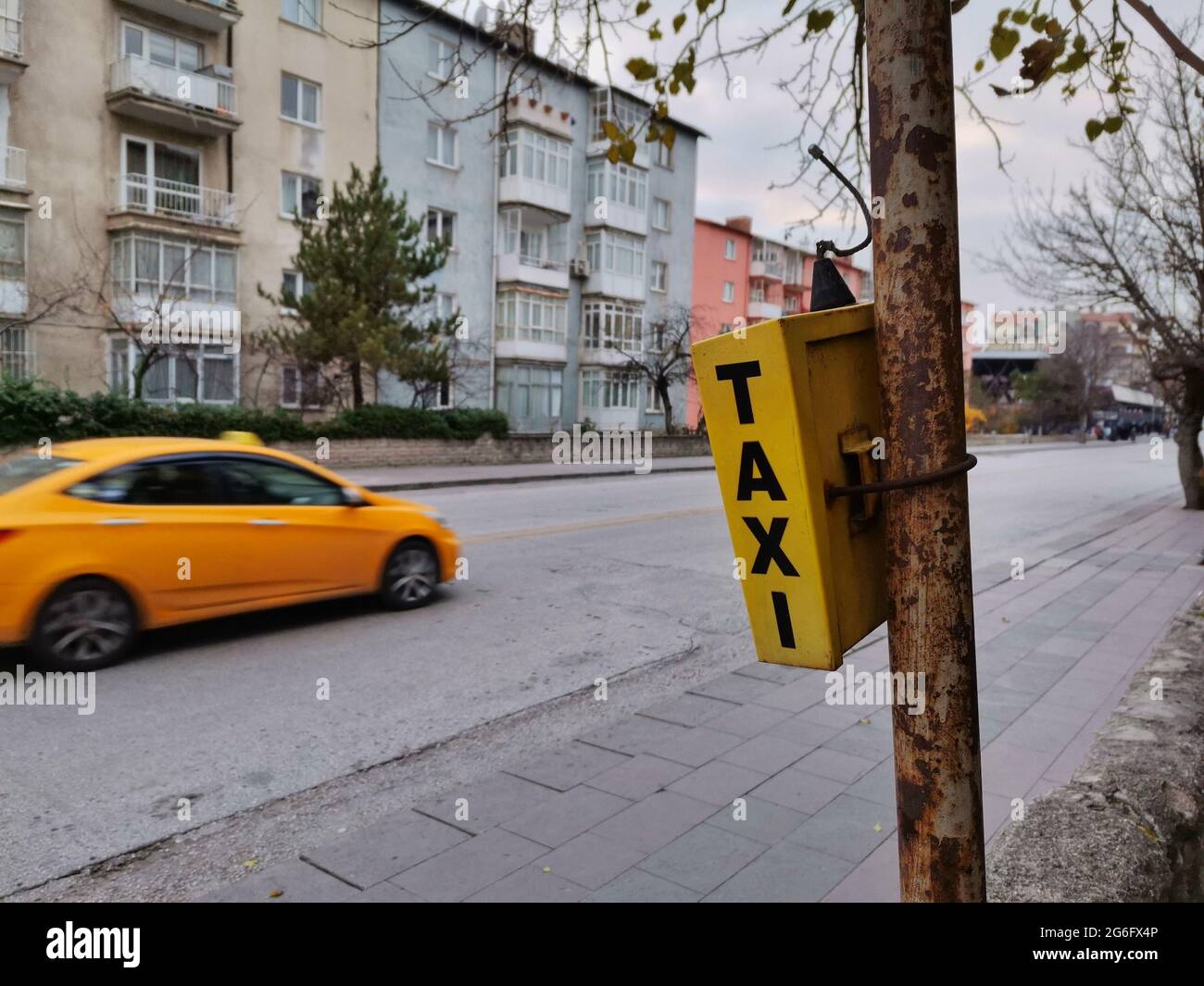 Taxi device and commercial taxi passing by Stock Photo - Alamy Taxi device and commercial taxi passing by Stock Photo - Alamy