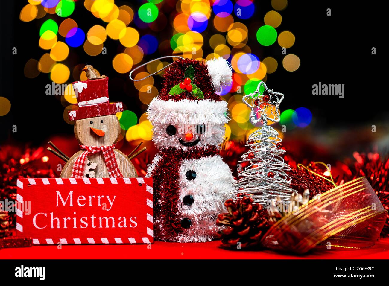 Closeup shot of Christmas decorations and toys on a blurred bokeh ...