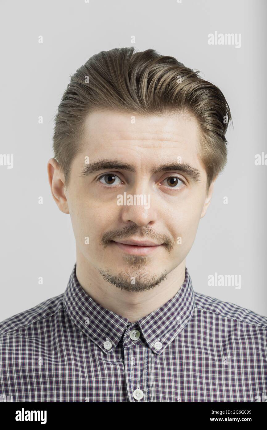 Portrait confident serious young man Stock Photo - Alamy