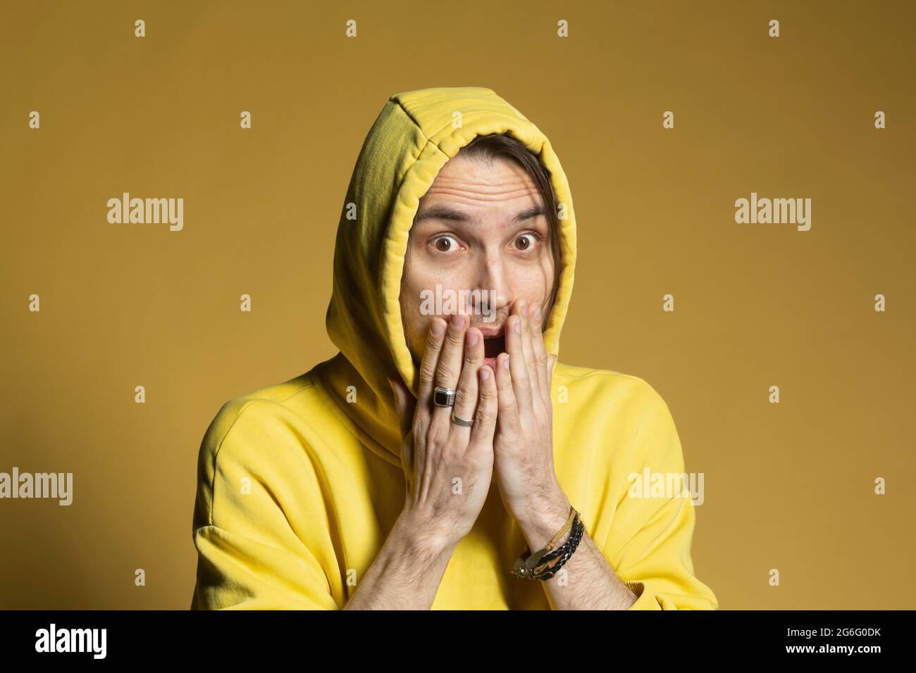 Yellow hoody hi-res stock photography and images - Alamy