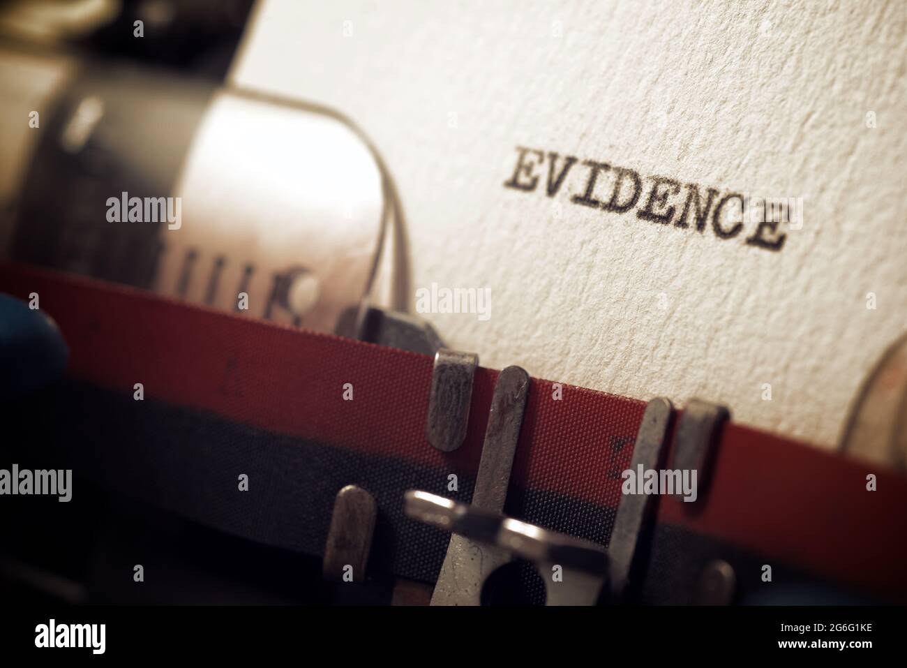 The word evidence written with a typewriter Stock Photo - Alamy