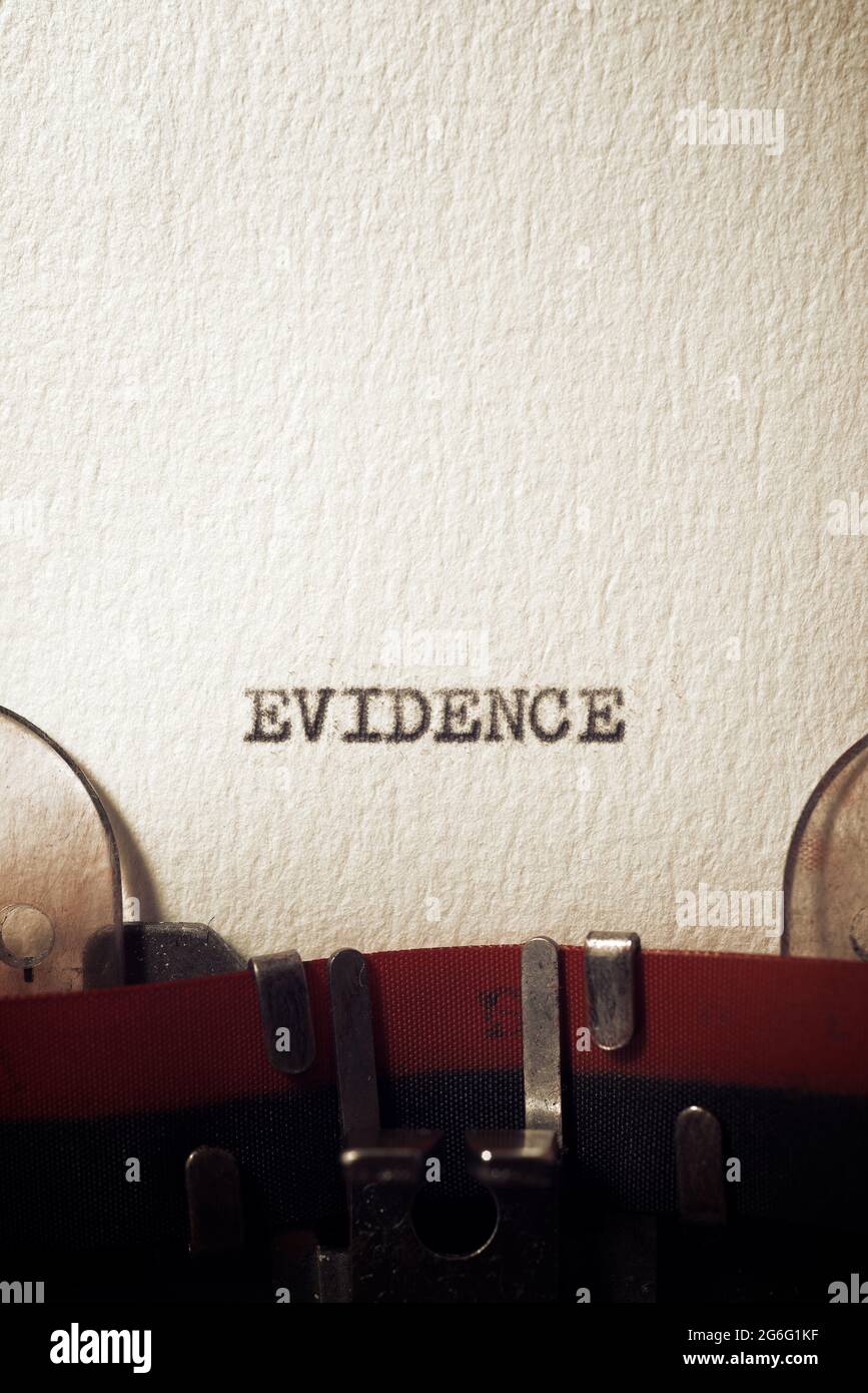 The word evidence written with a typewriter Stock Photo - Alamy