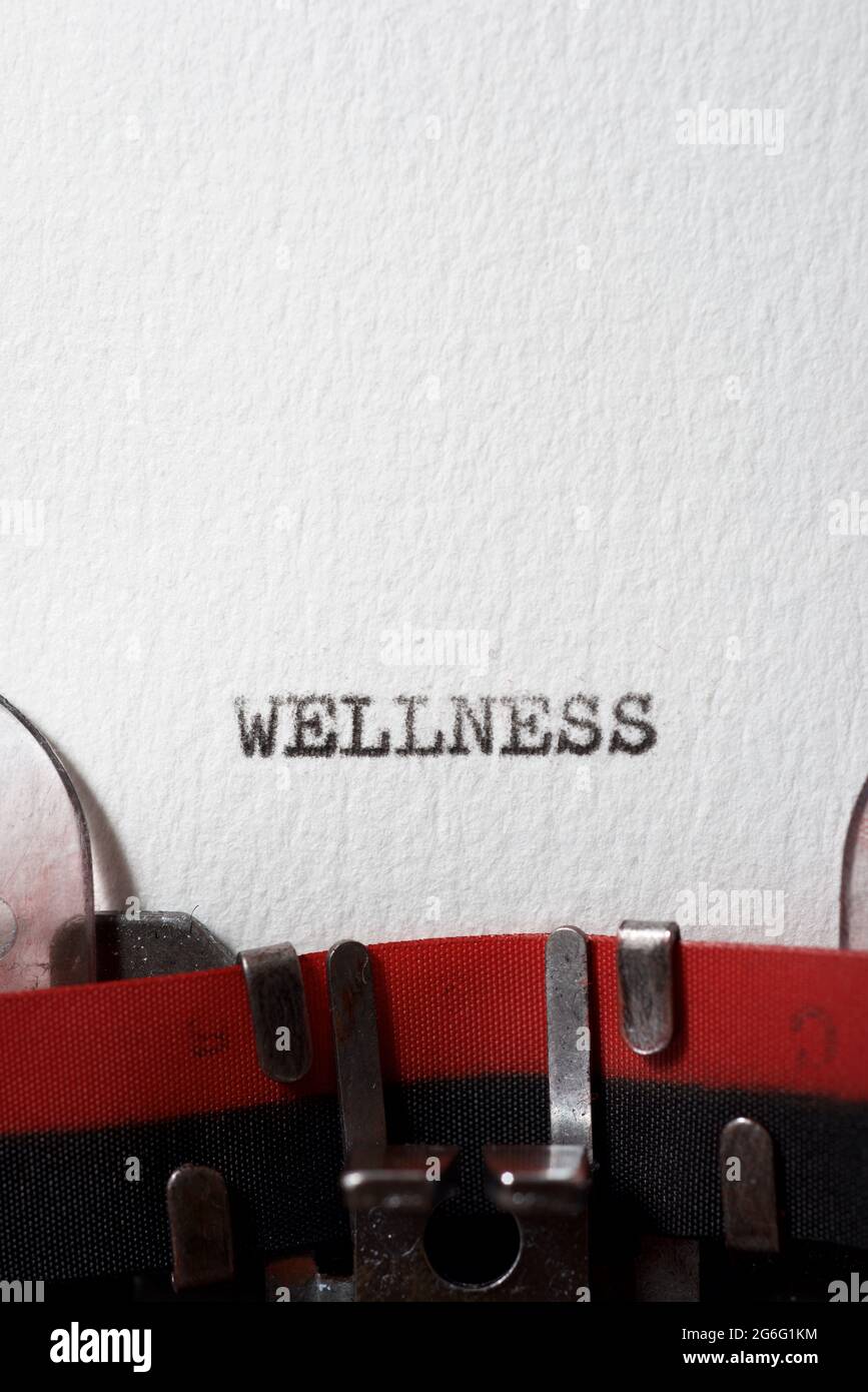 The word wellness written with a typewriter Stock Photo - Alamy