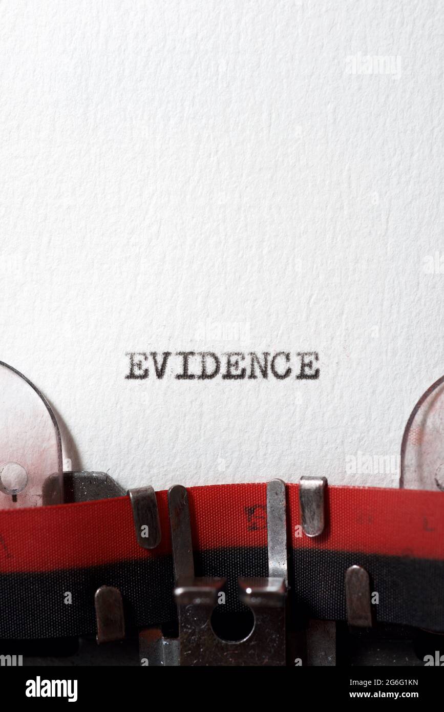 The word evidence written with a typewriter Stock Photo - Alamy