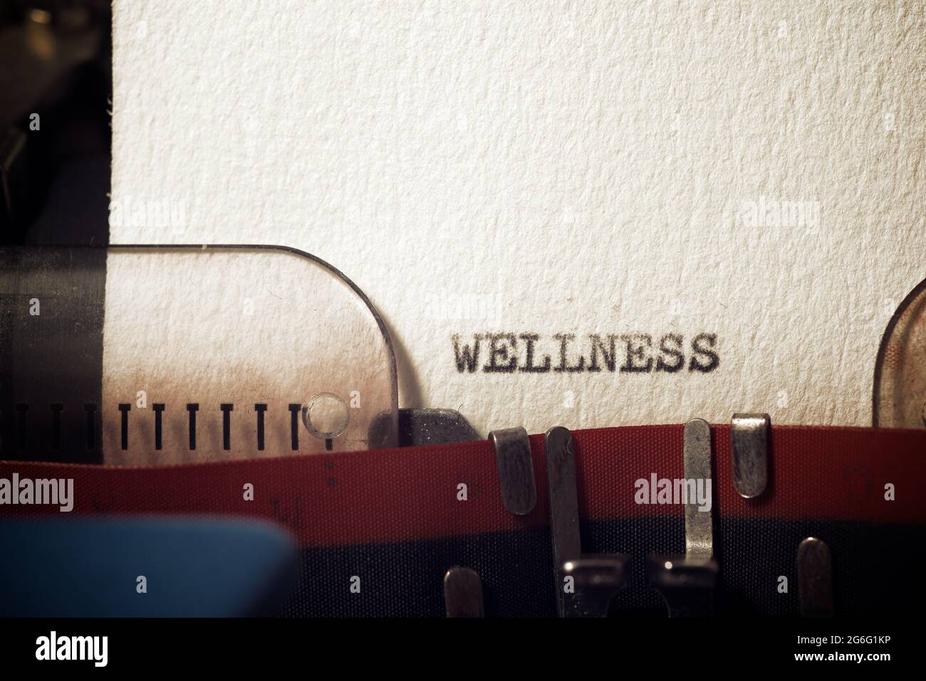 The word wellness written with a typewriter Stock Photo - Alamy