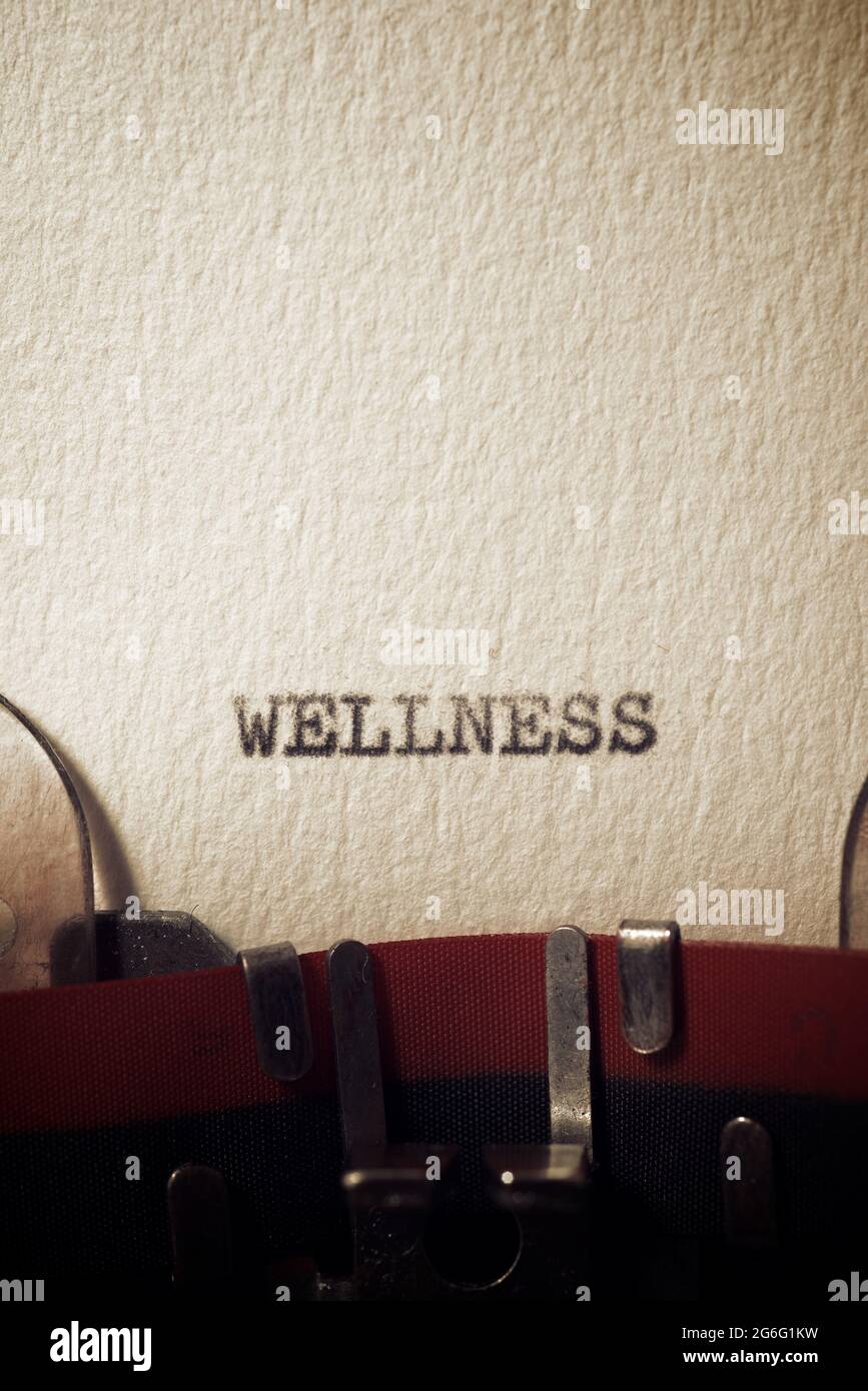 The word wellness written with a typewriter Stock Photo - Alamy