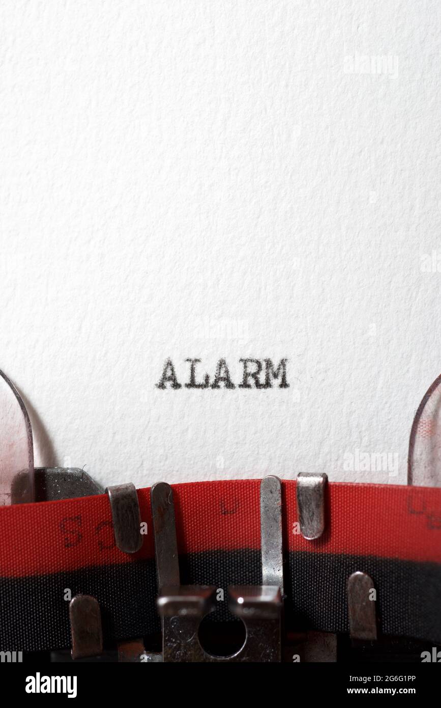 The word alarm written with a typewriter Stock Photo - Alamy