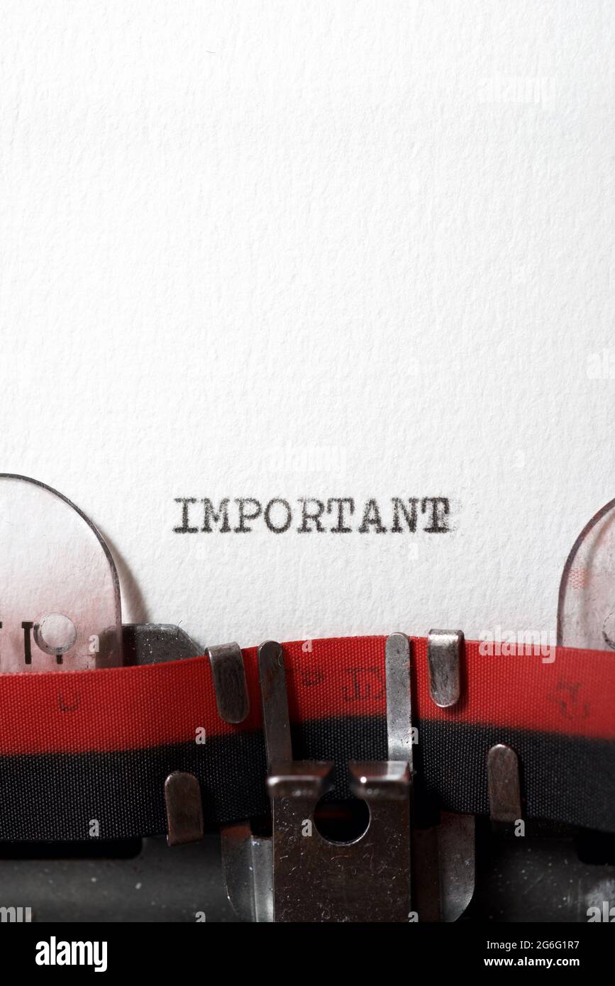 The word important written with a typewriter Stock Photo - Alamy