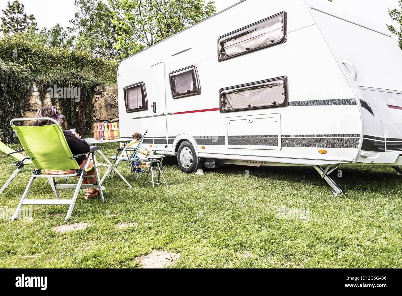 Nature travel in the new normal, safe holidays in nature. Caravan in ...