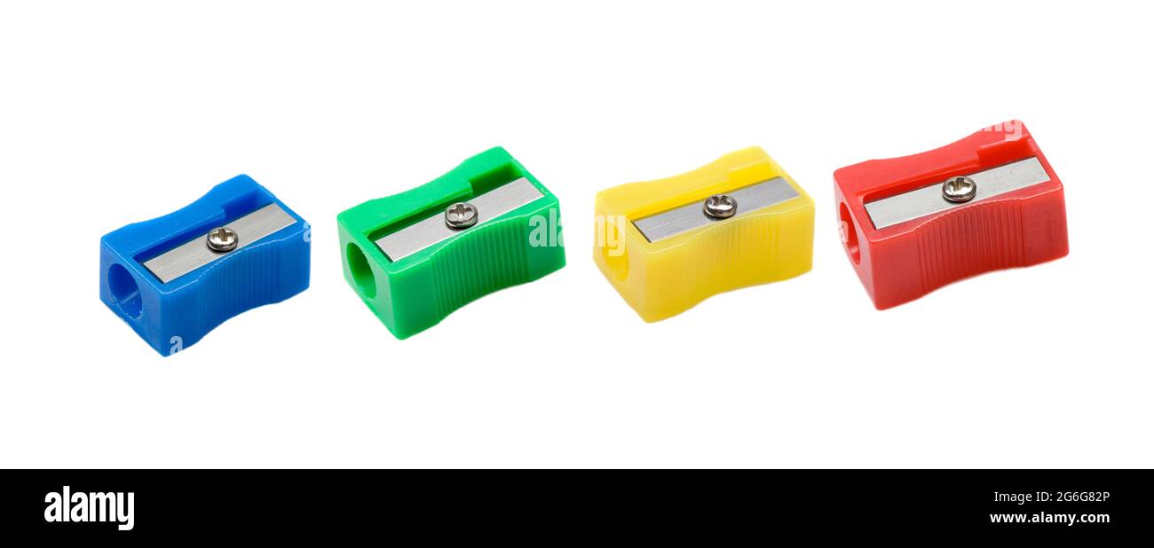 Four pencil sharpener with different colors isolated on a white ...