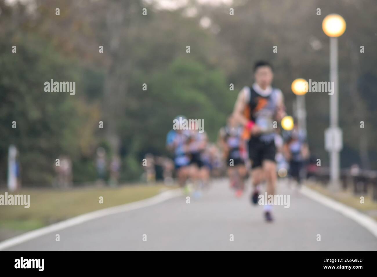 Blurred Group of people running in a marathon Stock Photo - Alamy