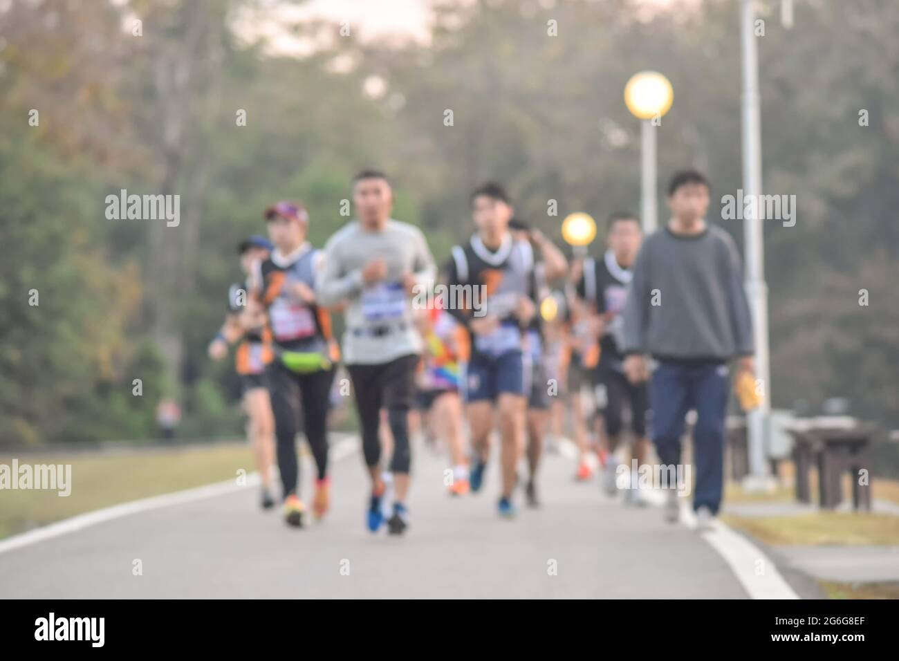 Blurred Group of people running in a marathon Stock Photo - Alamy