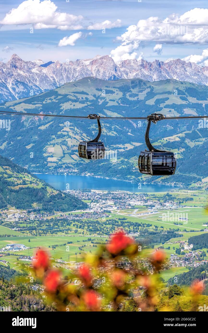 Panoramatic modern Cable cars against town of Zell am See in the Zell ...