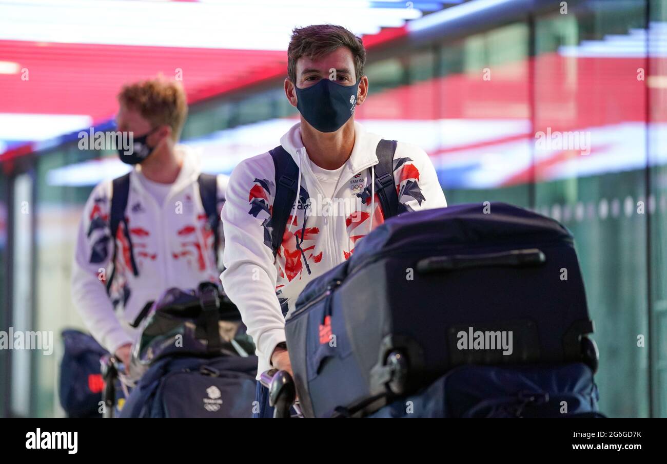 Team GB's Dylan Fletcher (right) arrives at Heathrow Terminal 5 before ...