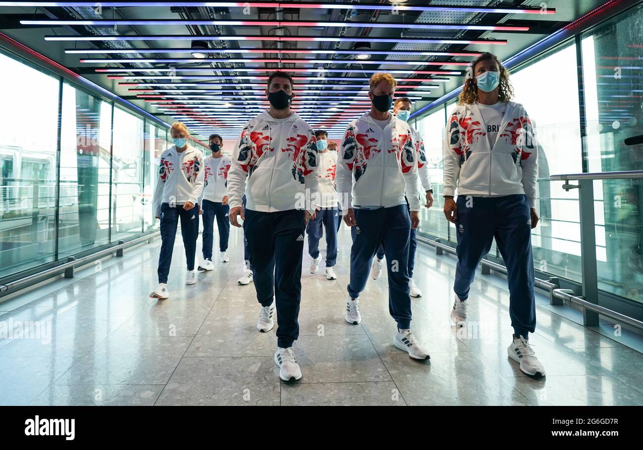 Members of the Team GB Sailing team walk towards camera as they pose ...