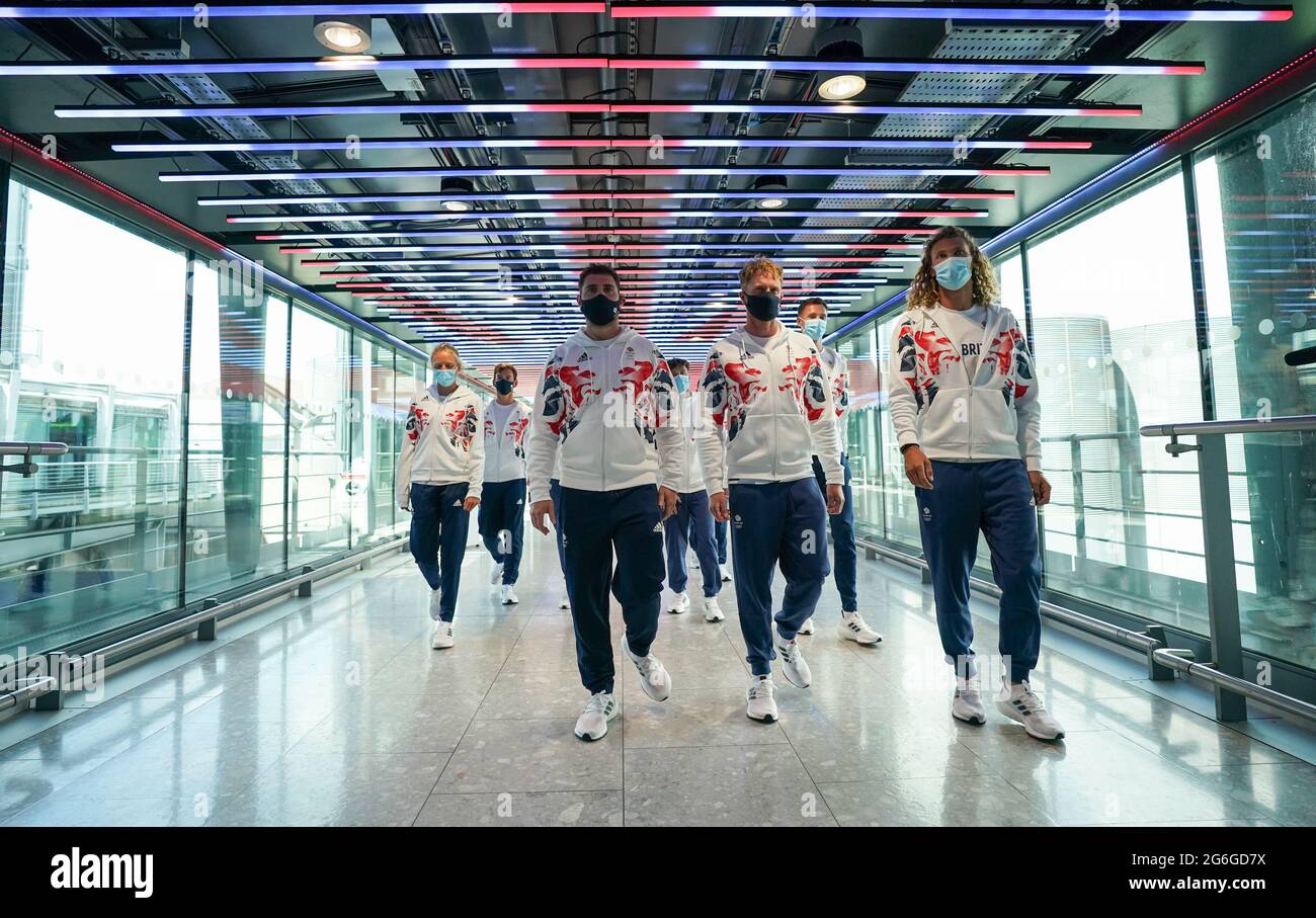Members of the Team GB Sailing team walk towards camera as they pose ...