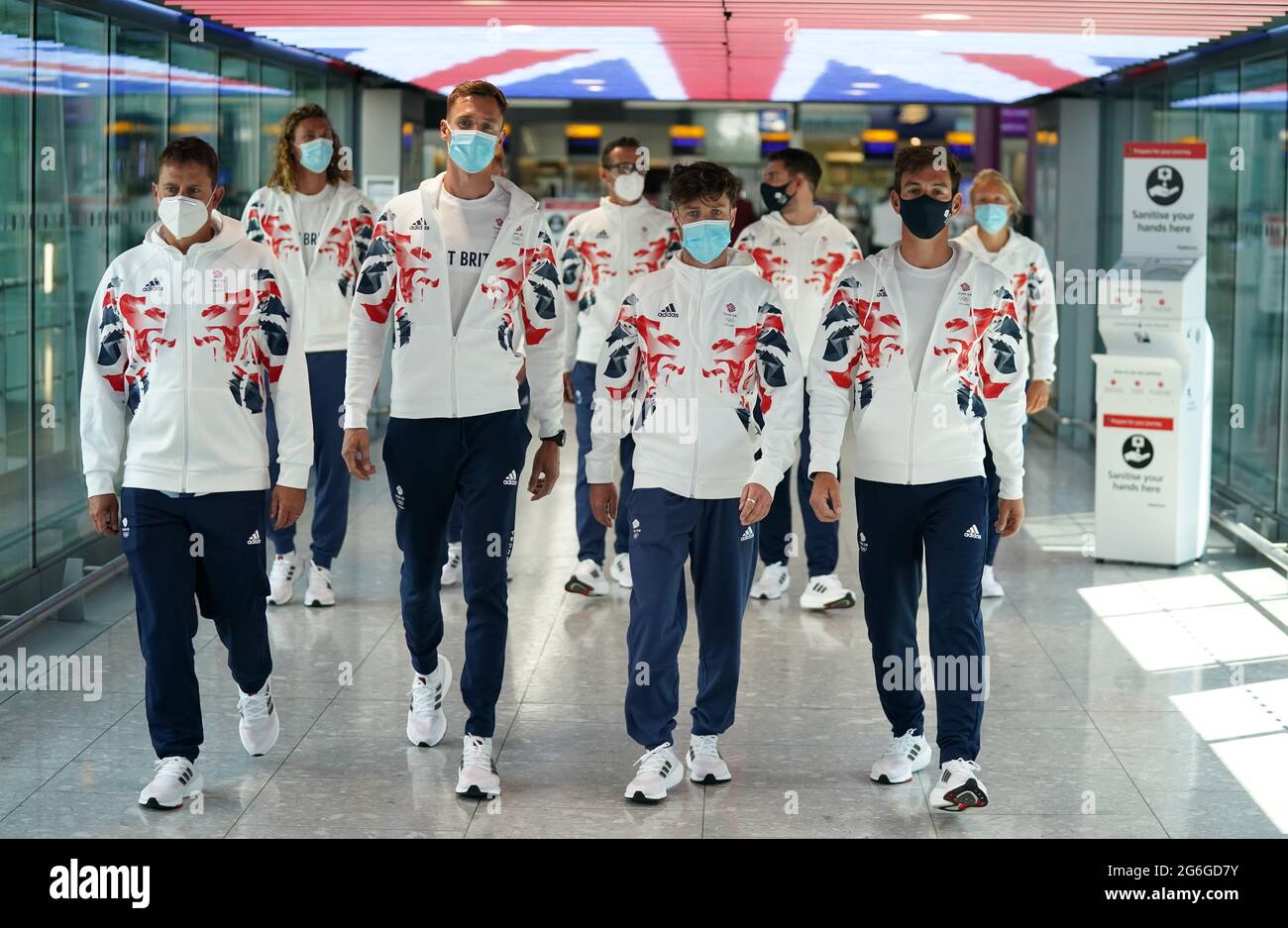 Members of the Team GB Sailing team walk towards camera as they pose ...