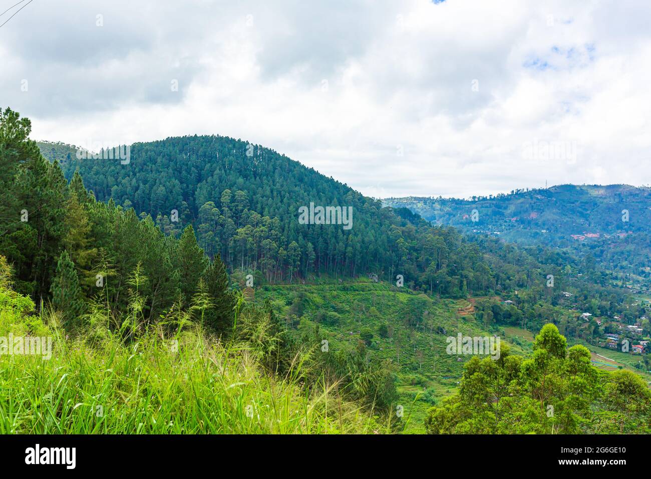 Wonderful natural landscape. Green hilly valley Stock Photo - Alamy