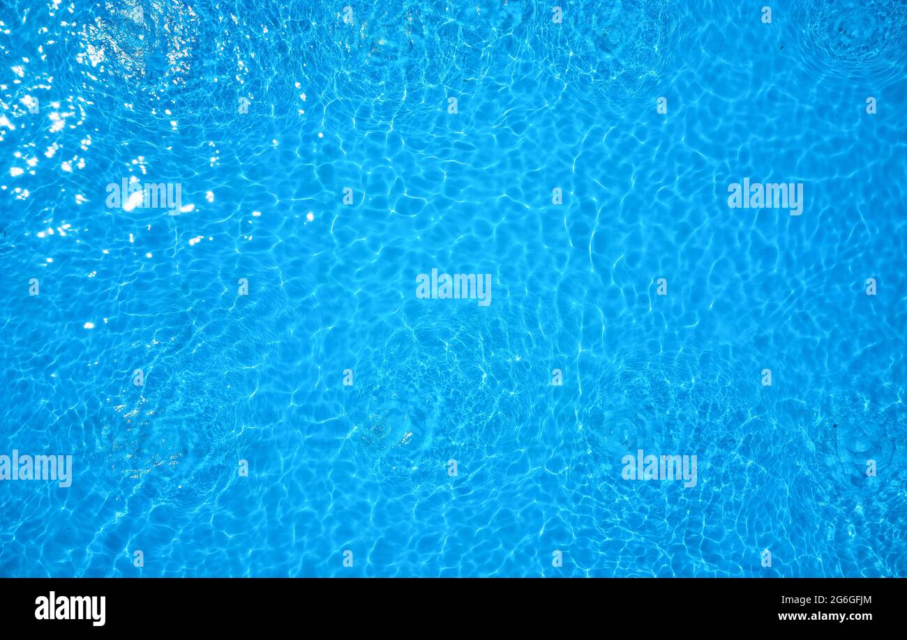 Clear blue swimming pool water Stock Photo - Alamy