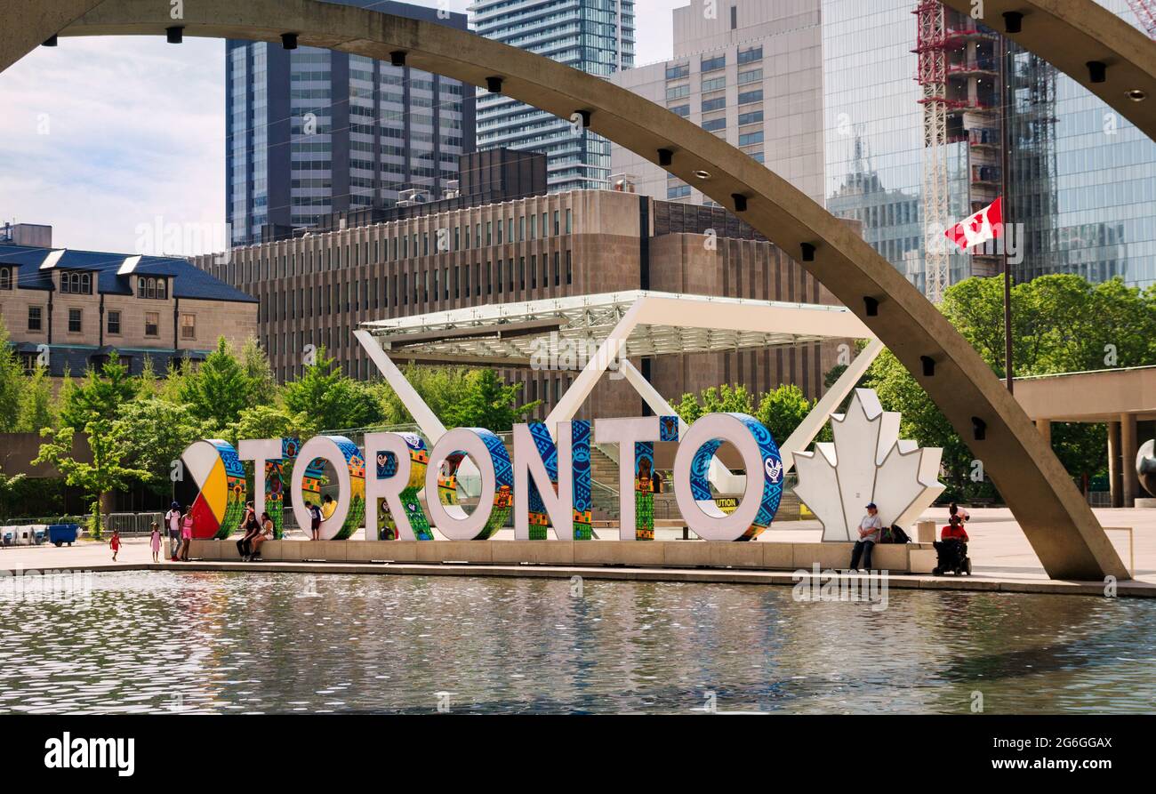 TORONTO, CANADA - 06 05 2021: Summer view on new TORONTO sign behind ...
