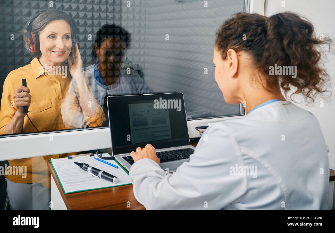 Hearing test booth hi-res stock photography and images - Alamy