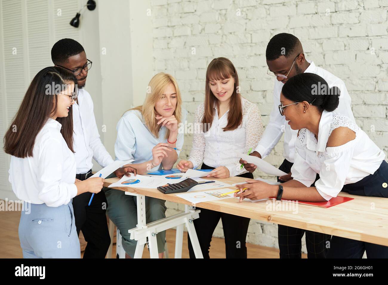 Professional team asian european hi-res stock photography and images ...