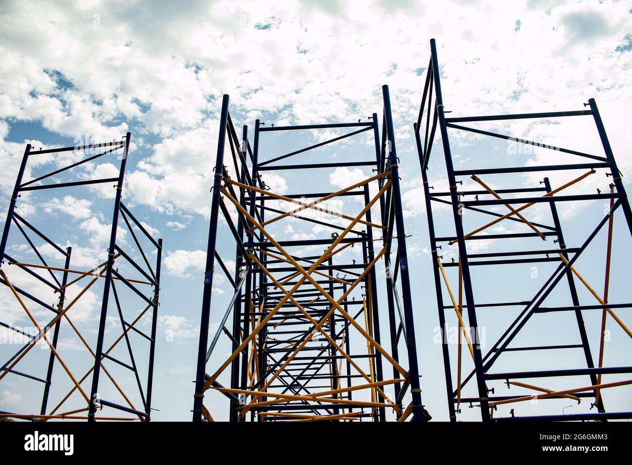 Construction site with scaffolding tower and building. Scaffolding for ...