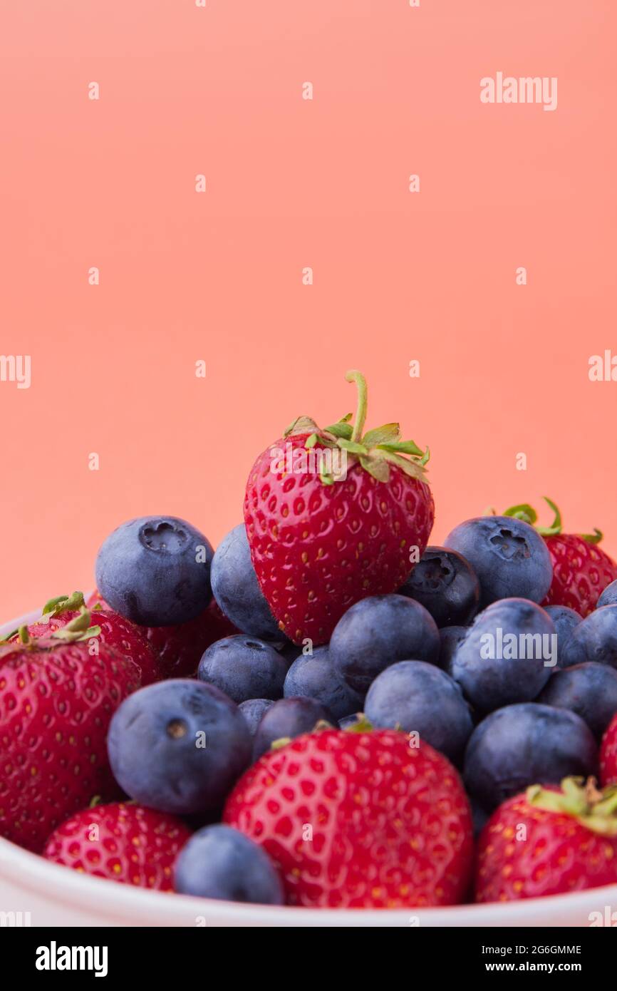 Close-up pile of strawberries and blueberries and copy space Stock ...