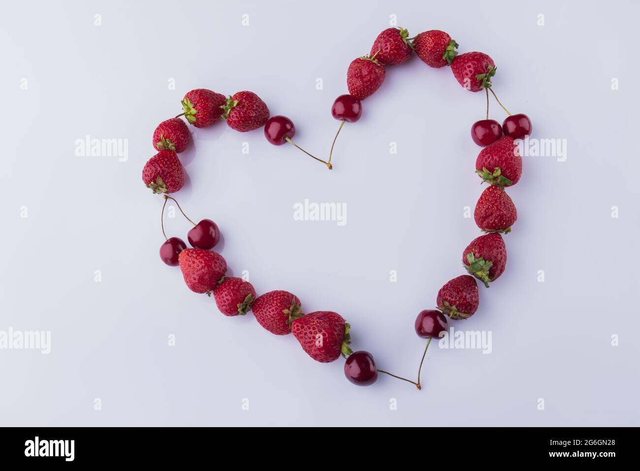 Arrangement of Perfect Raw Strawberries in Square Shape Black Bowl ...