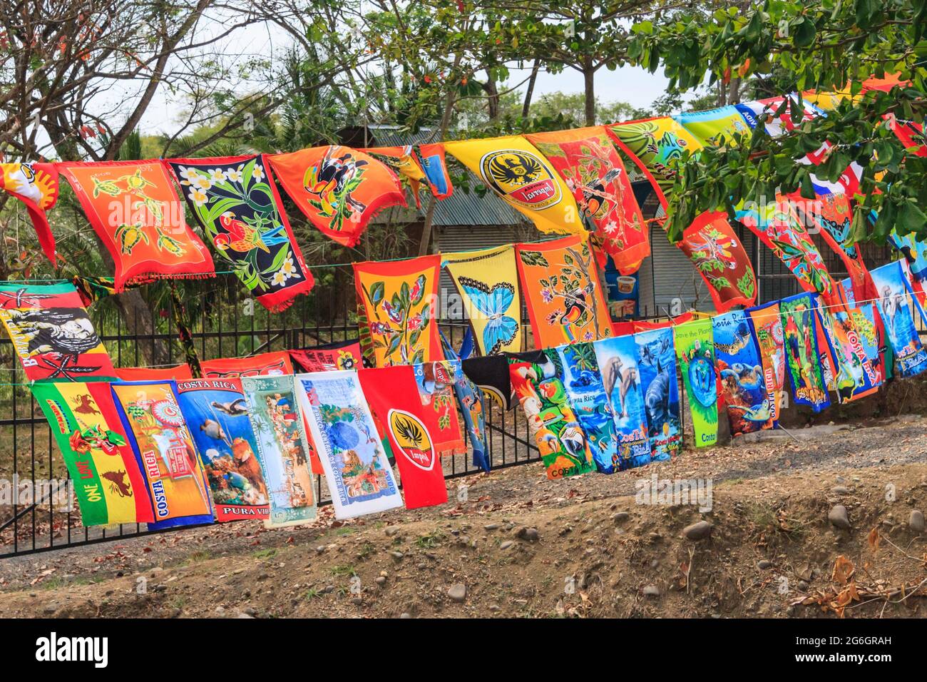 Clourful towels and sarongs on display at a tourist gift shop, Tarcoles ...