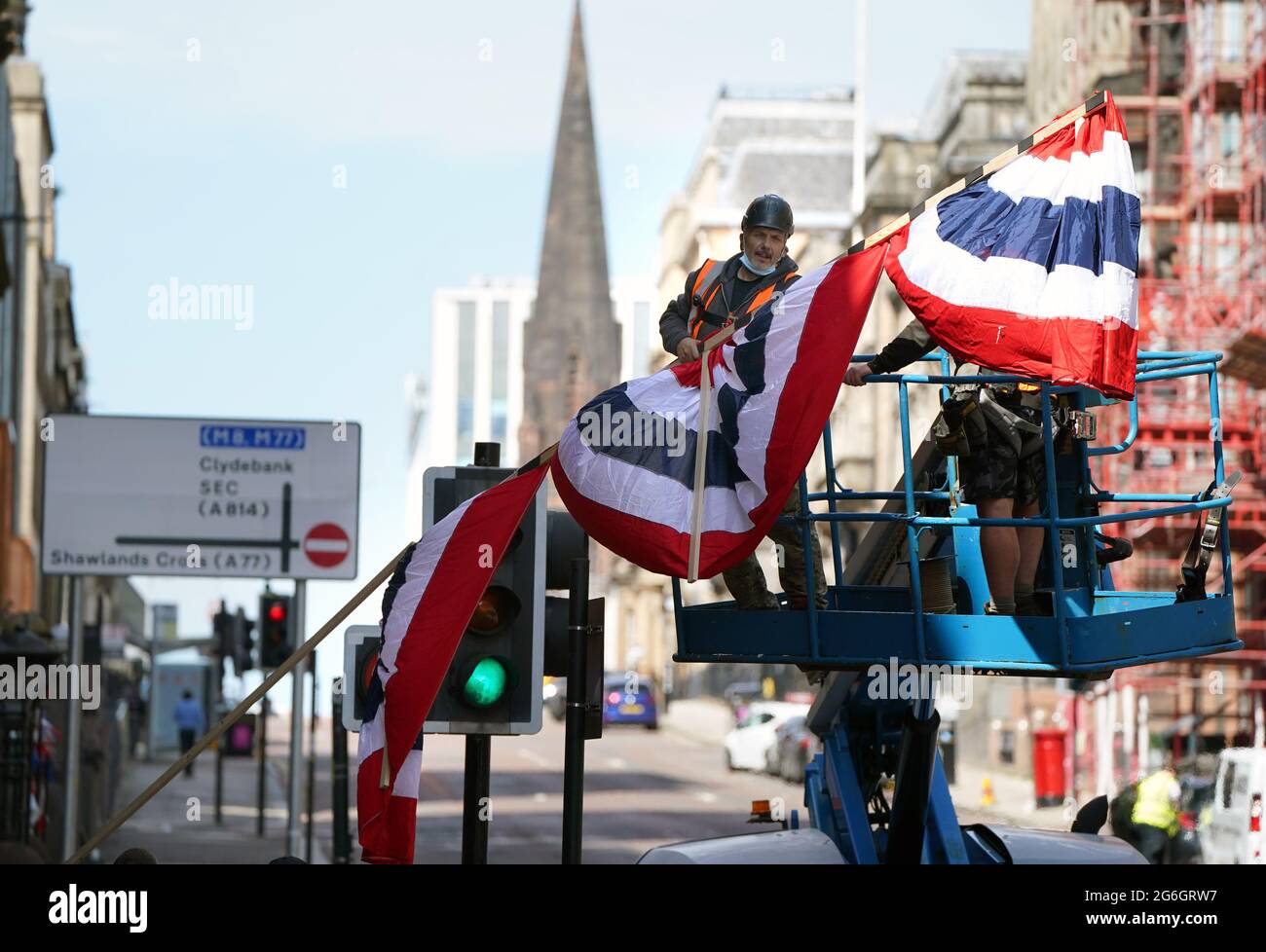 Bunting is put up in St Vincent Street in Glasgow city centre ahead of ...