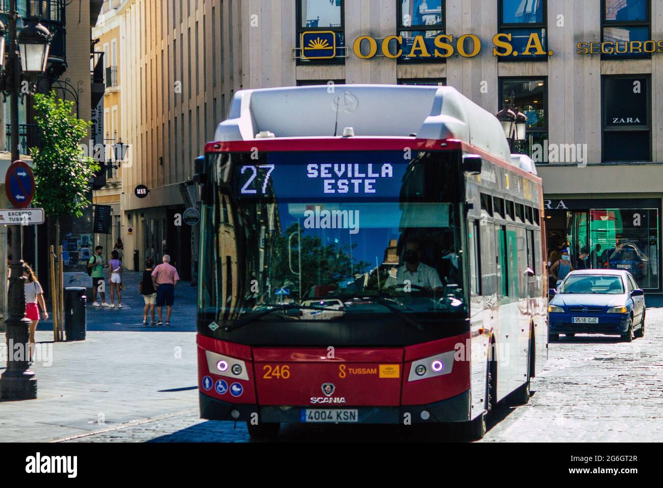 Seville Spain July 05, 2021 Bus driving through the streets of Seville ...