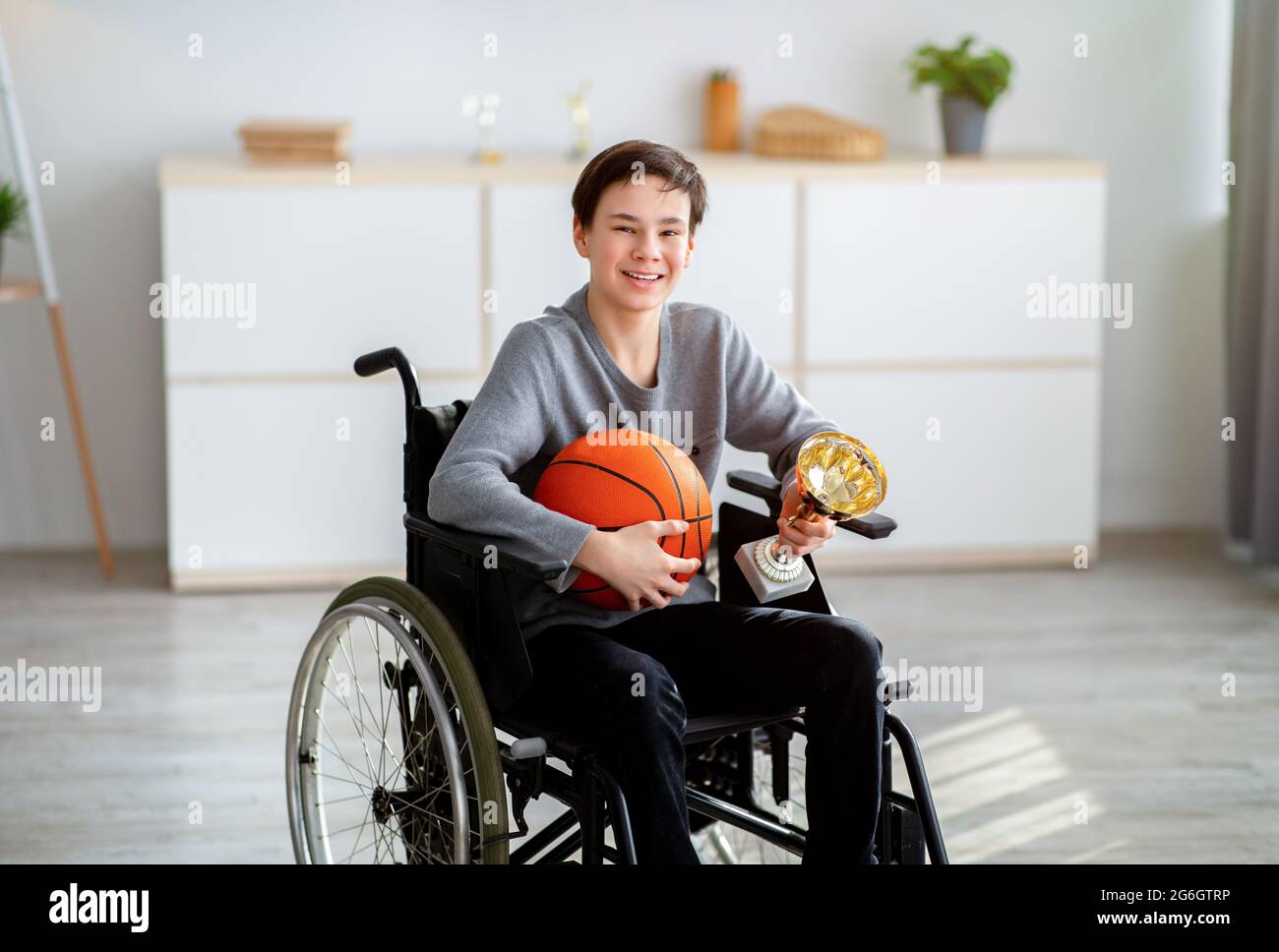 Disabled teen smiling hi-res stock photography and images - Alamy